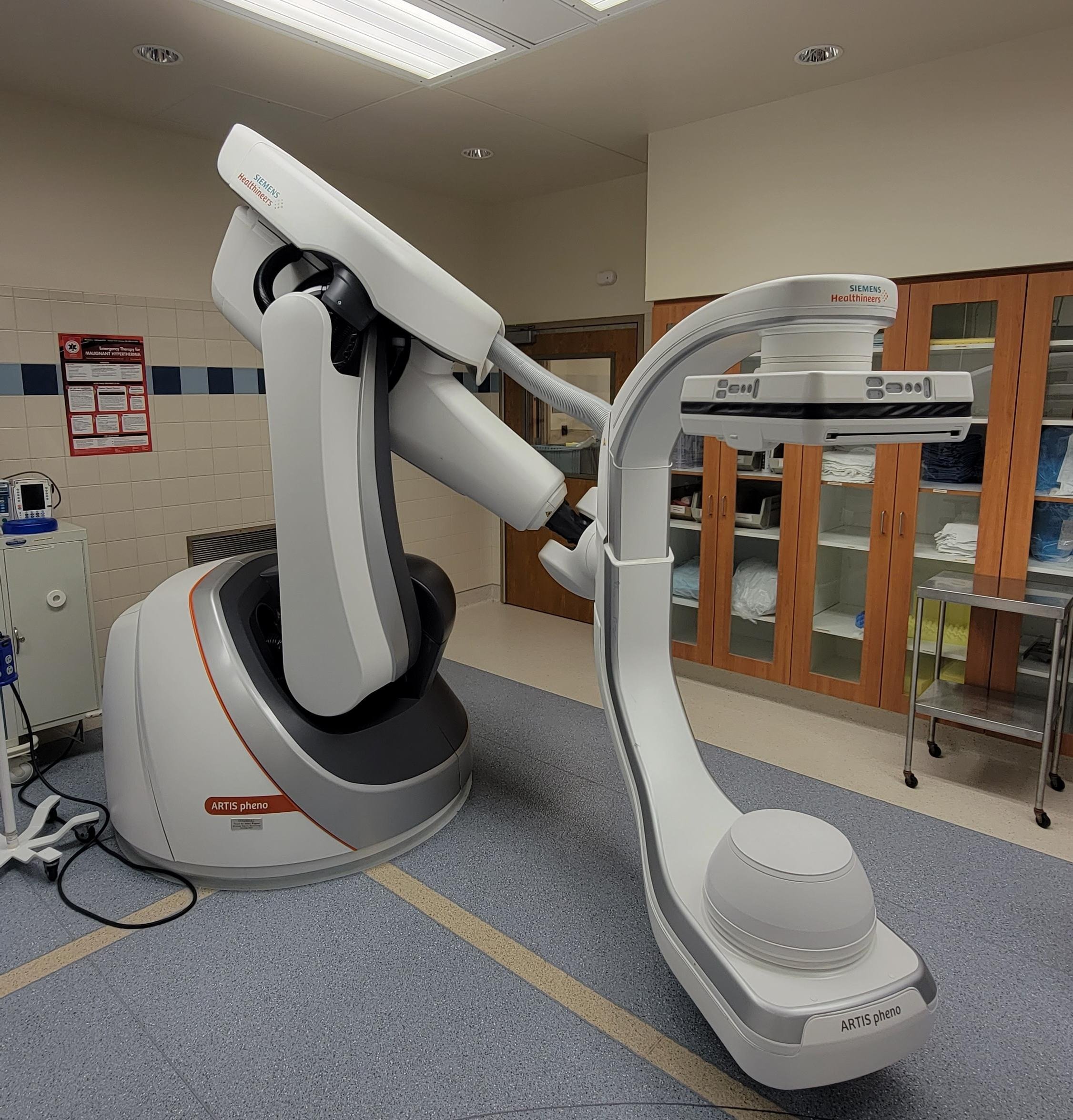 Robotic C-Arm Angiography System